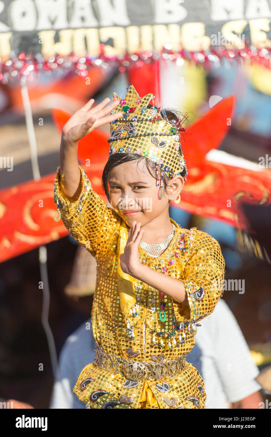 Young girl perform Traditional dance inside the Bajau's boat called ...