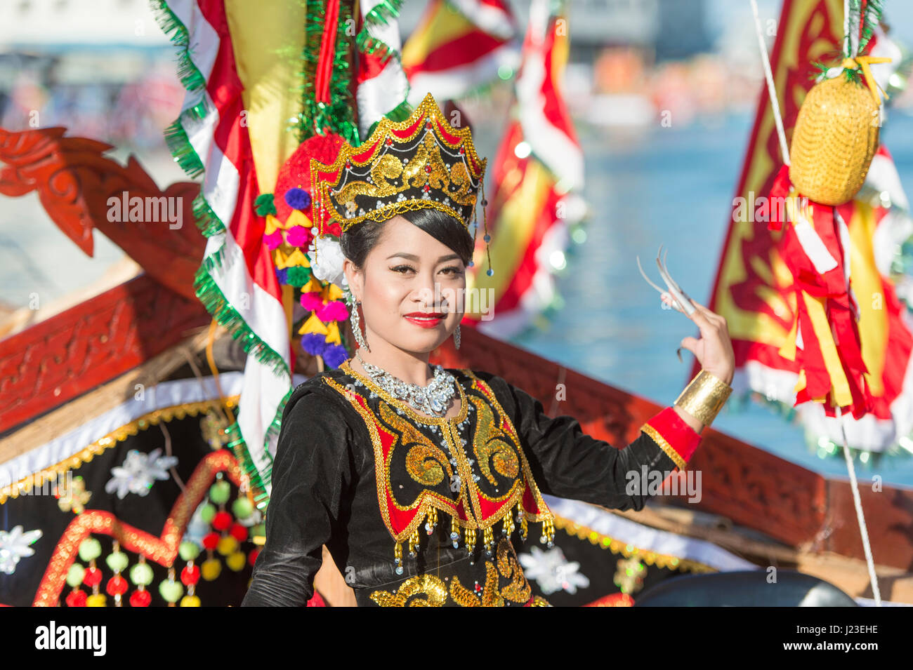 Young girl perform Traditional dance inside the Bajau's boat called ...