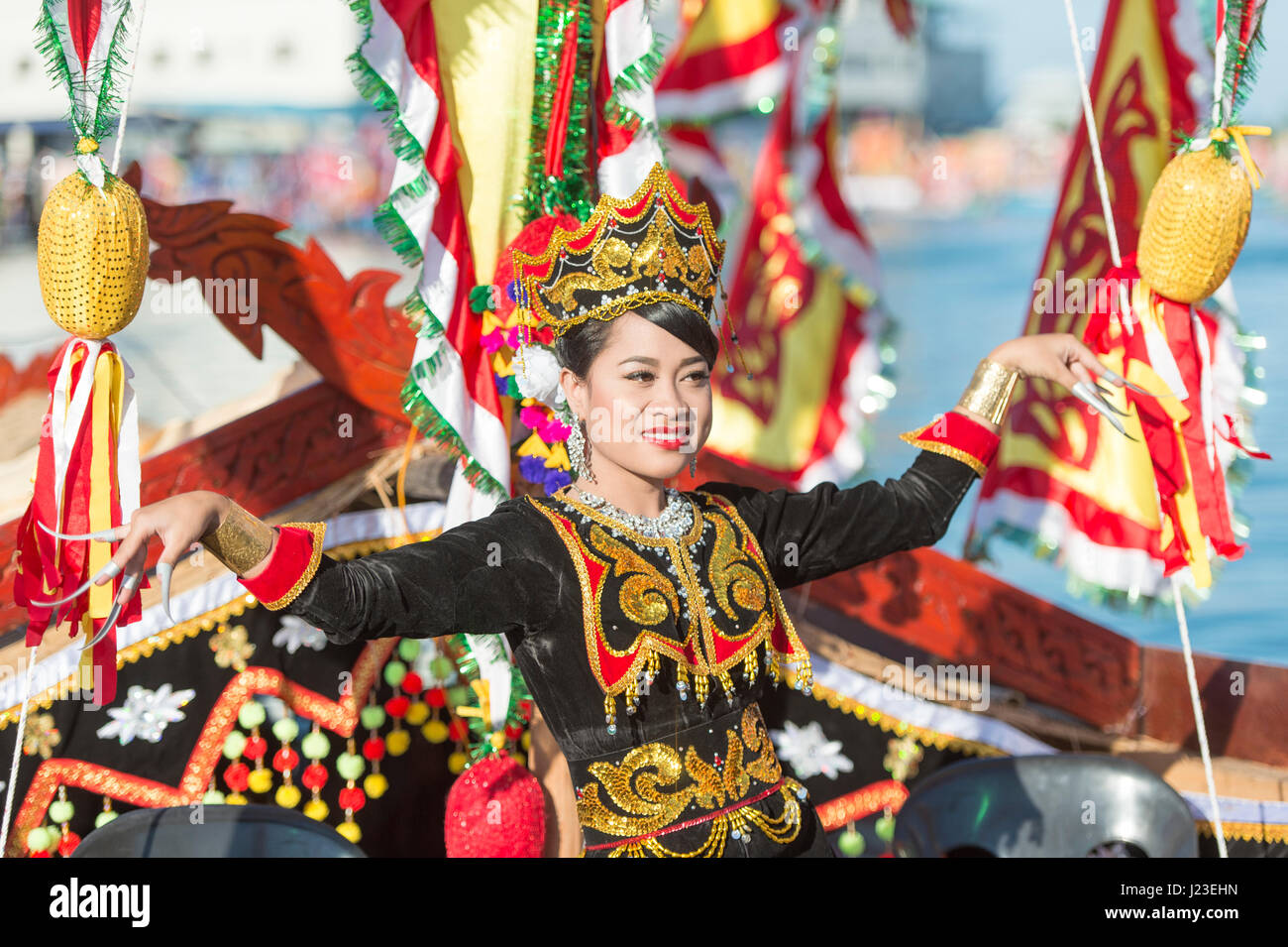 Young girl perform Traditional dance inside the Bajau's boat called ...
