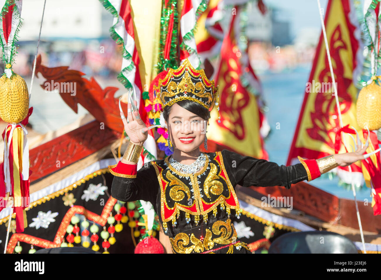 Young girl perform Traditional dance inside the Bajau's boat called ...