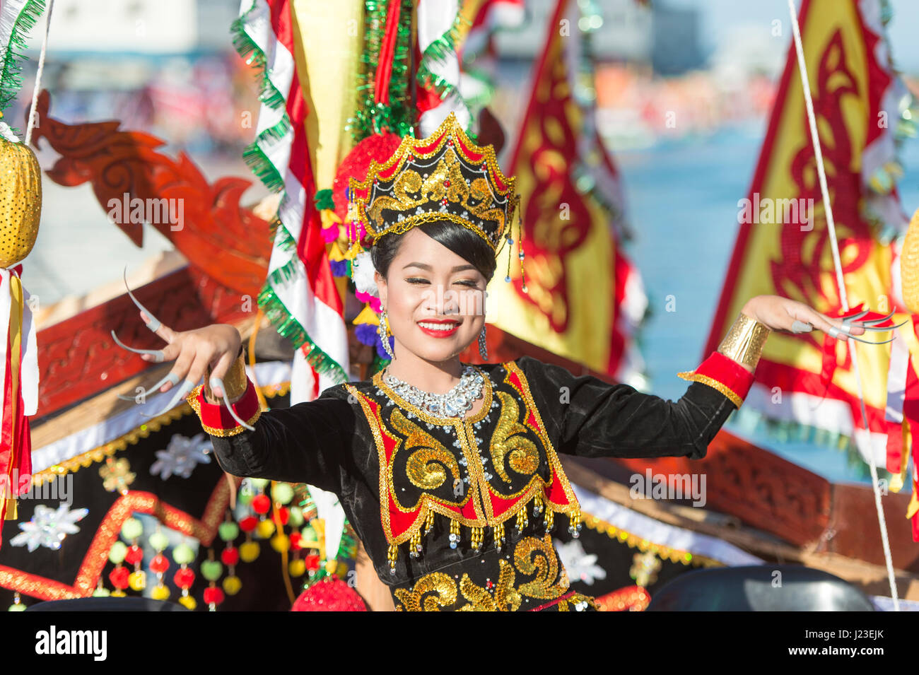 Young girl perform Traditional dance inside the Bajau's boat called ...