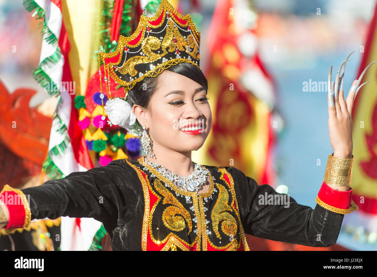 Young girl perform Traditional dance inside the Bajau's boat called ...