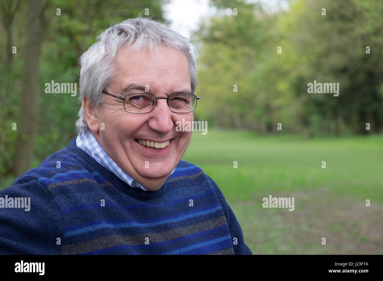 Happy senior man smiling hi-res stock photography and images - Alamy