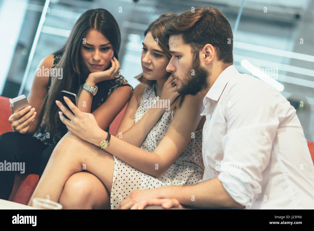 Young people using their cell phones and staying always connected Stock ...