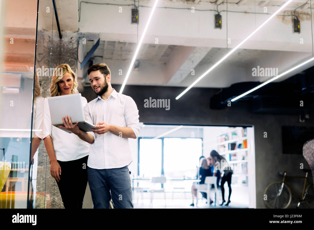 Male female coworkers office hi-res stock photography and images - Alamy