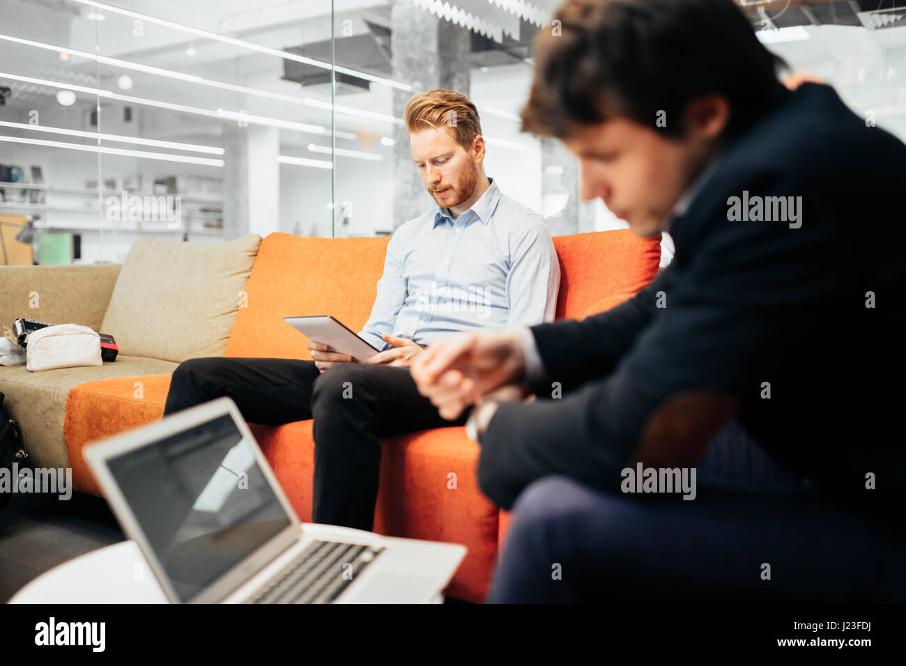 Business colleagues resting and talking during break Stock Photo - Alamy