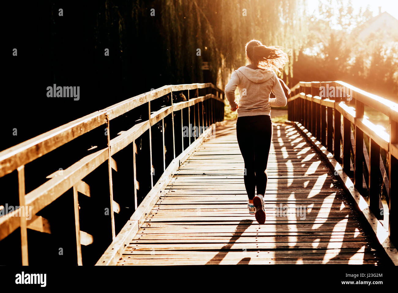 Beautiful slim female runner hi-res stock photography and images - Alamy