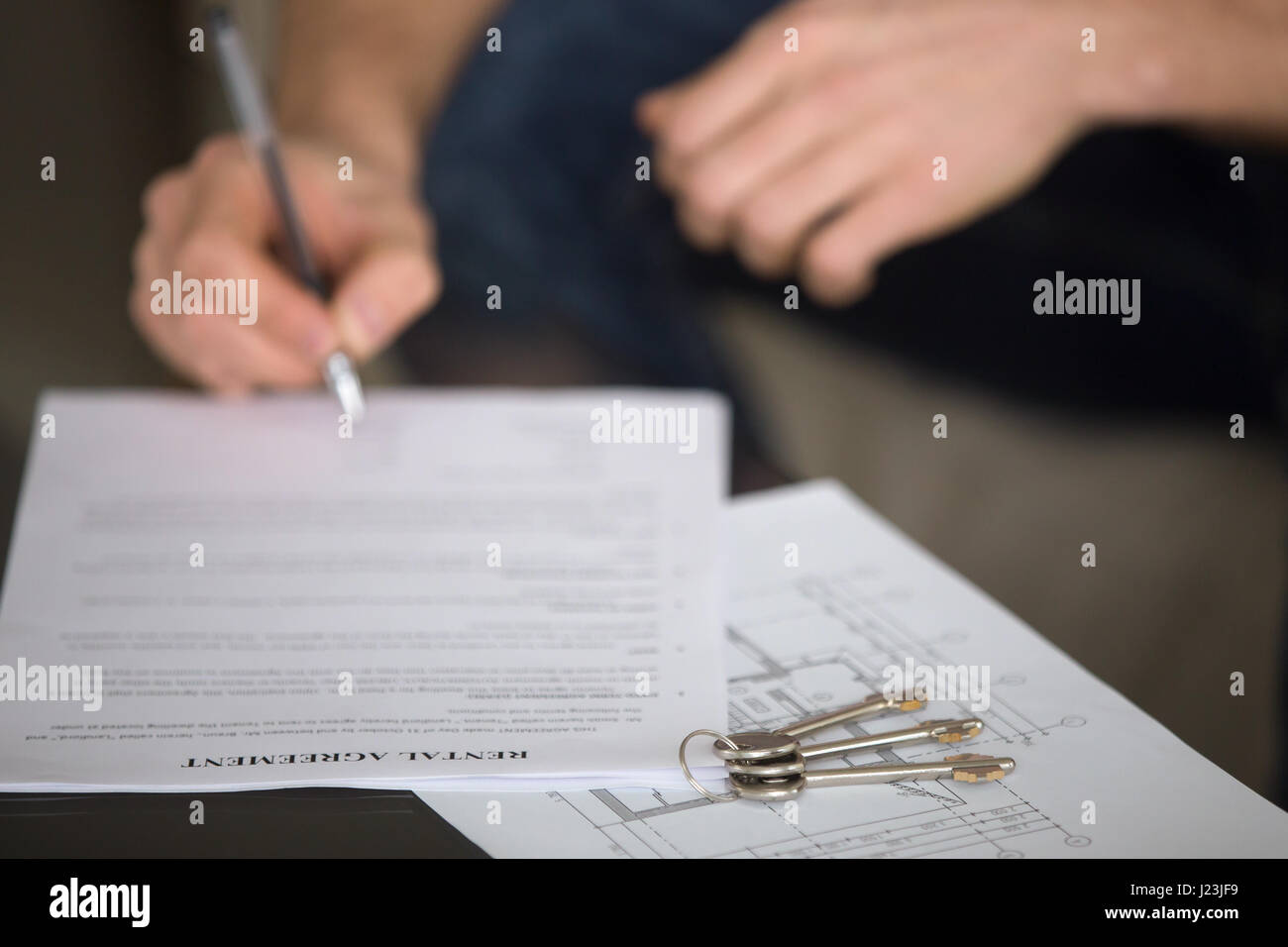 Man signing rental agreement, tenancy and rent concept, close up Stock ...