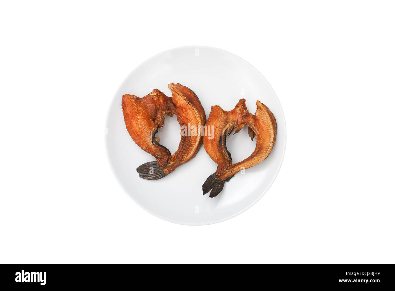 Fried Sun Dried Striped Snakehead Fish on Plate, Isolated Stock Photo ...