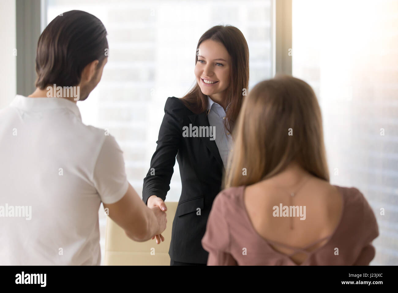 Business people shaking hands, greeting handshake with clients a Stock ...