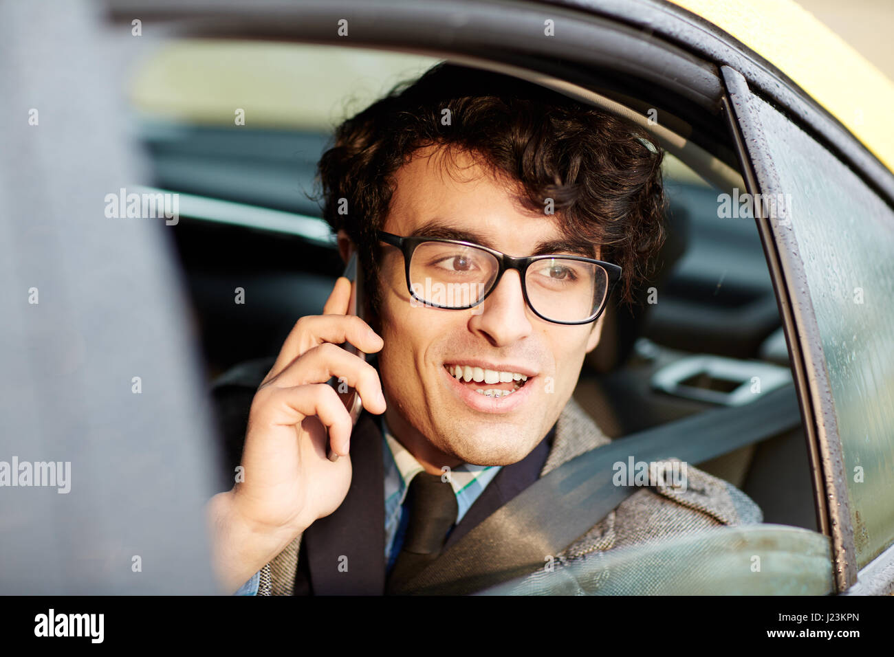 Man driving speaking on mobile hi-res stock photography and images - Alamy