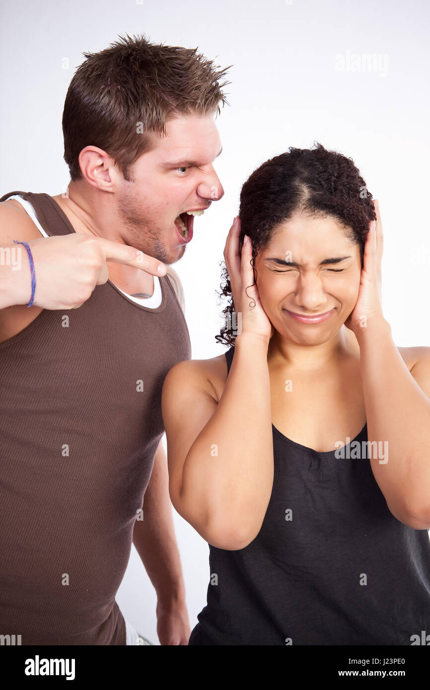 A personal trainer screaming at a woman Stock Photo - Alamy