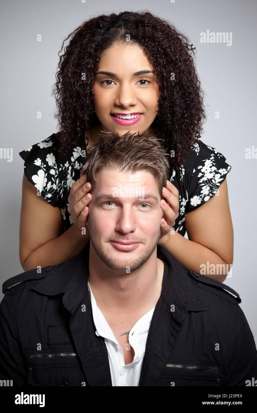 A portrait of a beautiful romantic interracial couple in love Stock ...