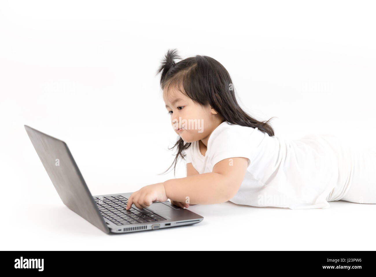 Asian girl working on computer Stock Photo - Alamy