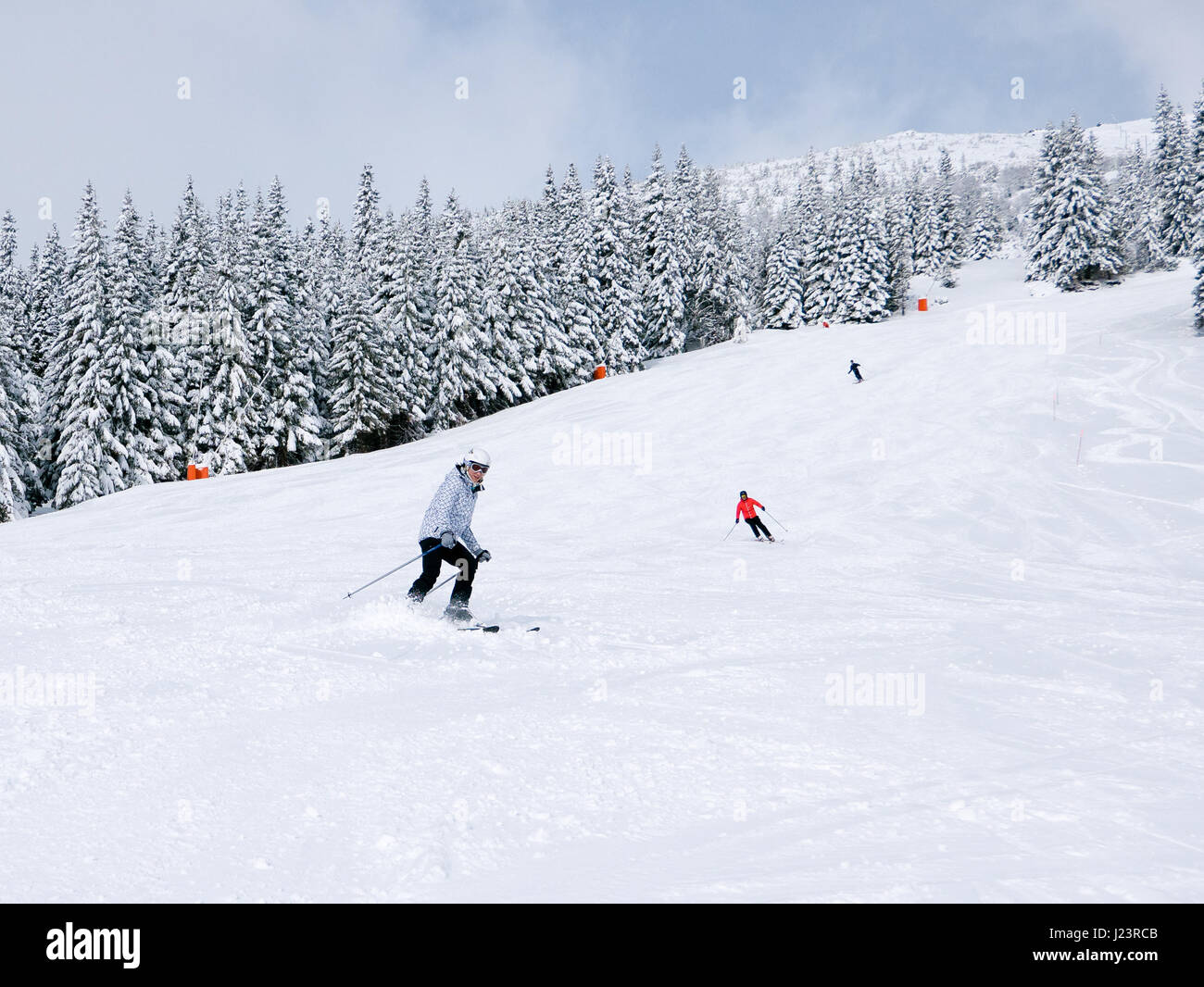 Skiers on the slope in ski resort Chopok in Slovakia. Tatra lower ...