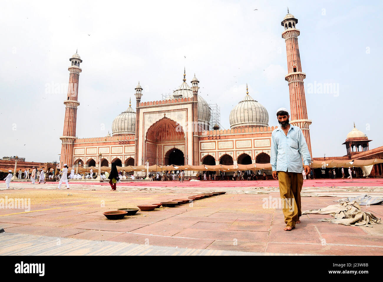 Delhi, India, september 3, 2010: Muslim men walking on in front of ...