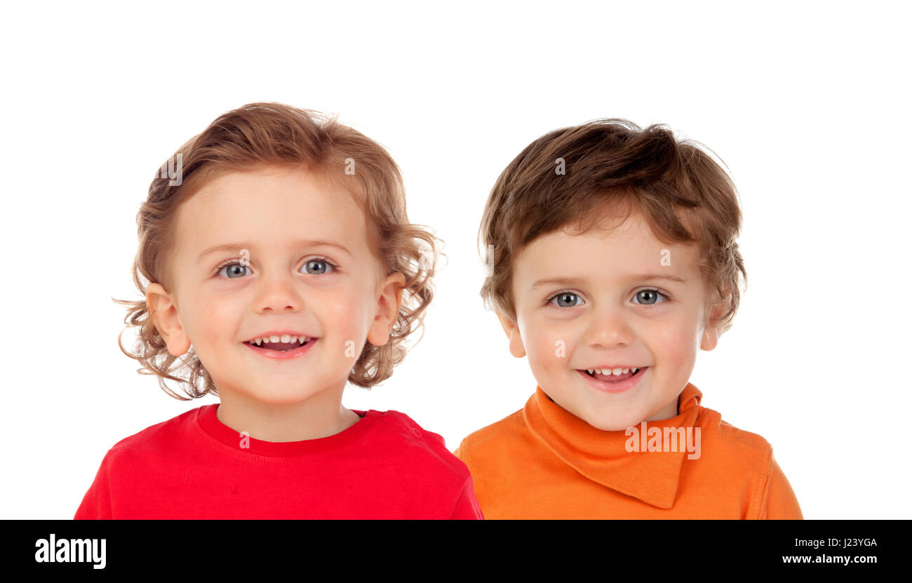 Beautiful twins laughing isolated on a white background Stock Photo - Alamy