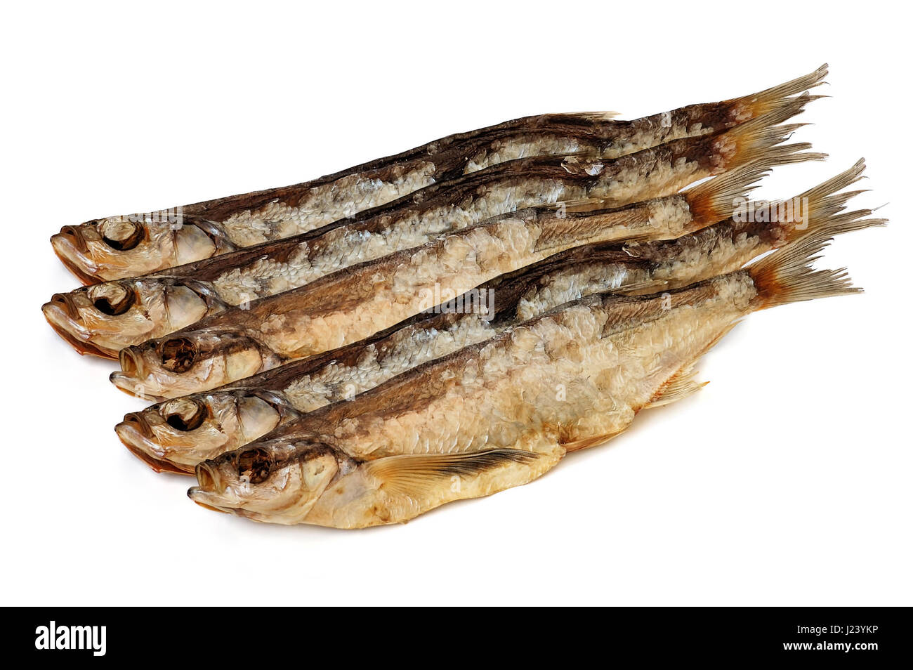 Dry fish isolated background Stock Photo - Alamy