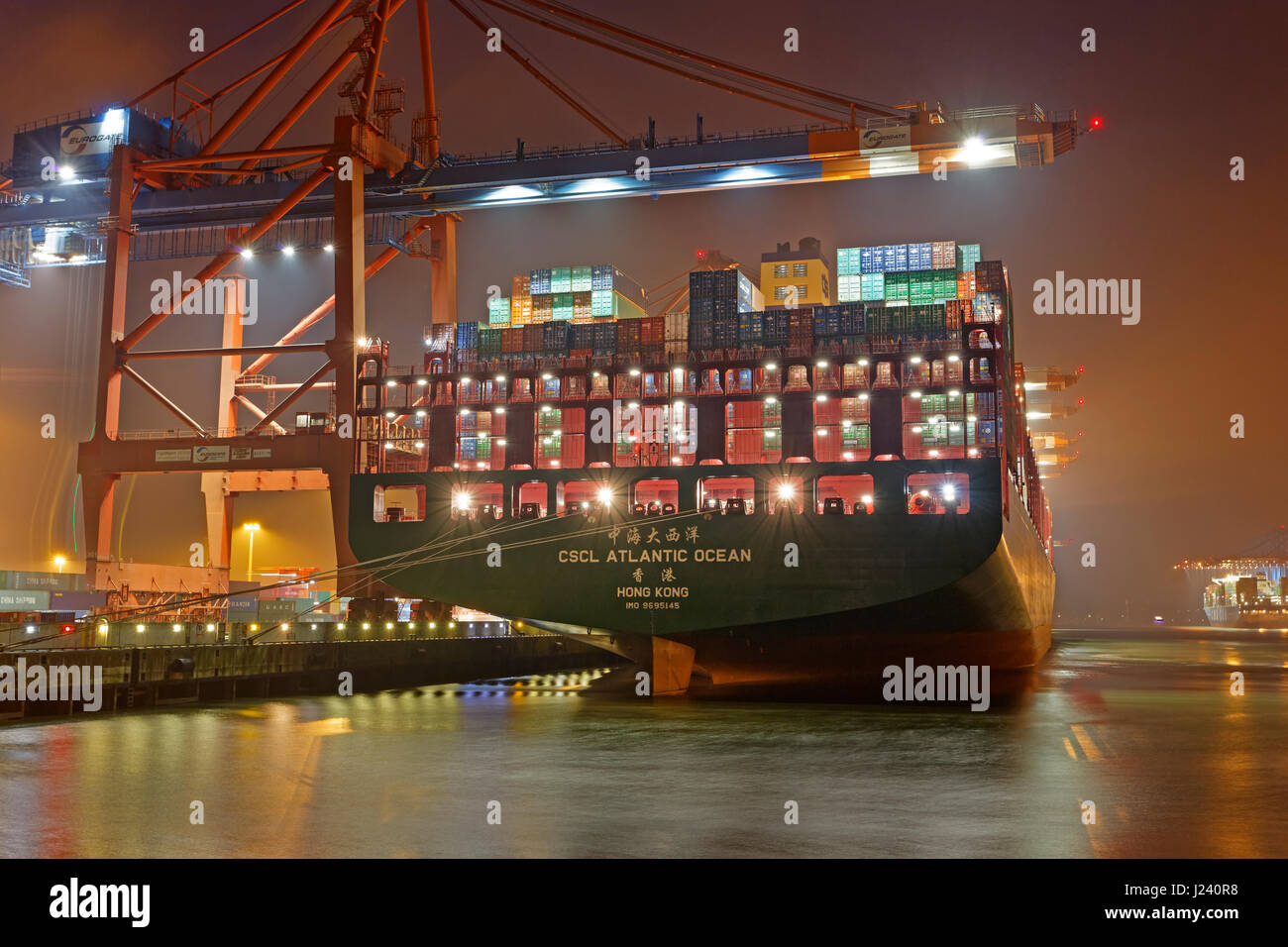 Container ship at night at Hamburg harbor, Containerterminal Eurogate ...