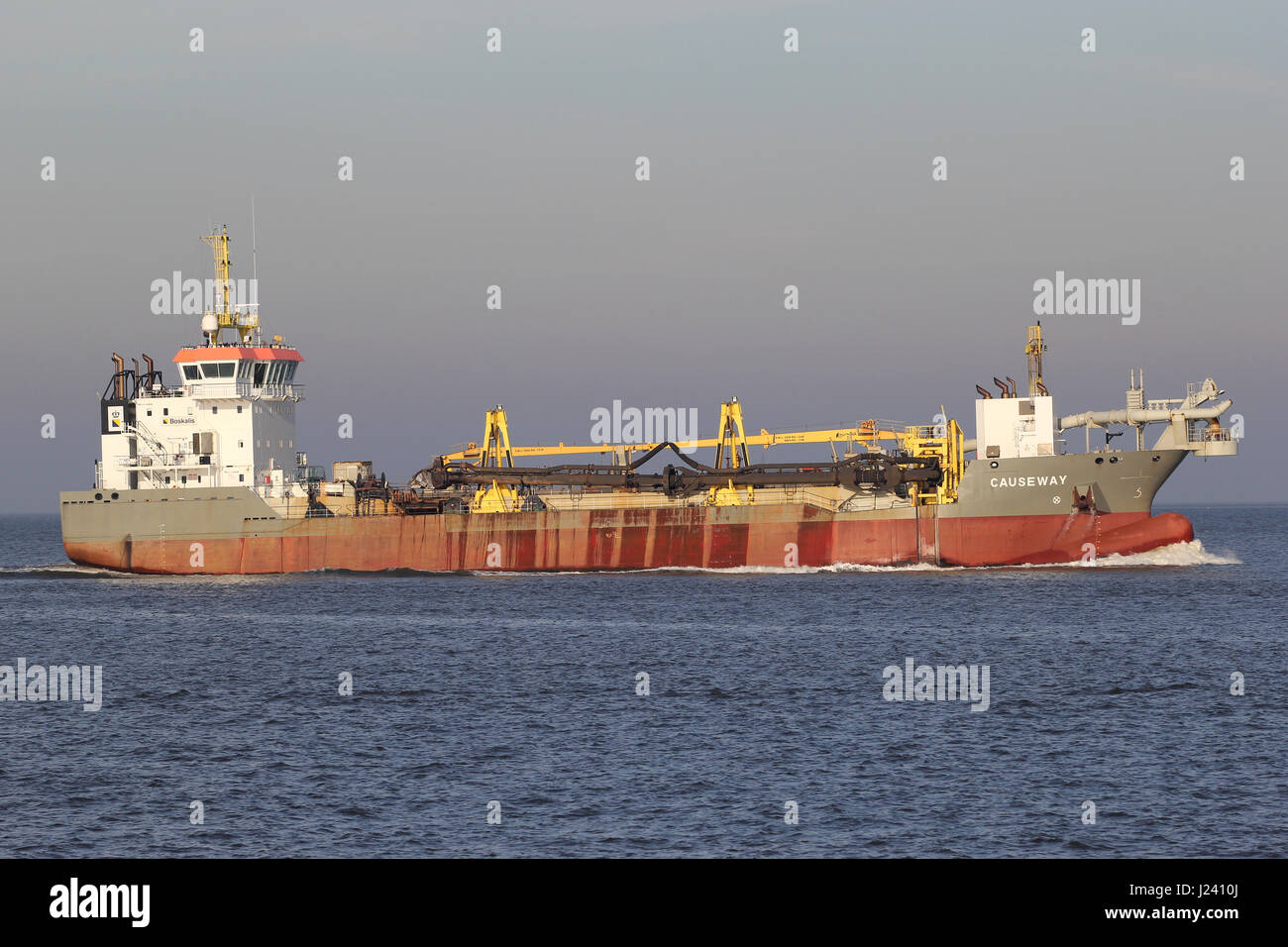 Trailing suction hopper dredger CAUSEWAY on the river Elbe. Royal ...