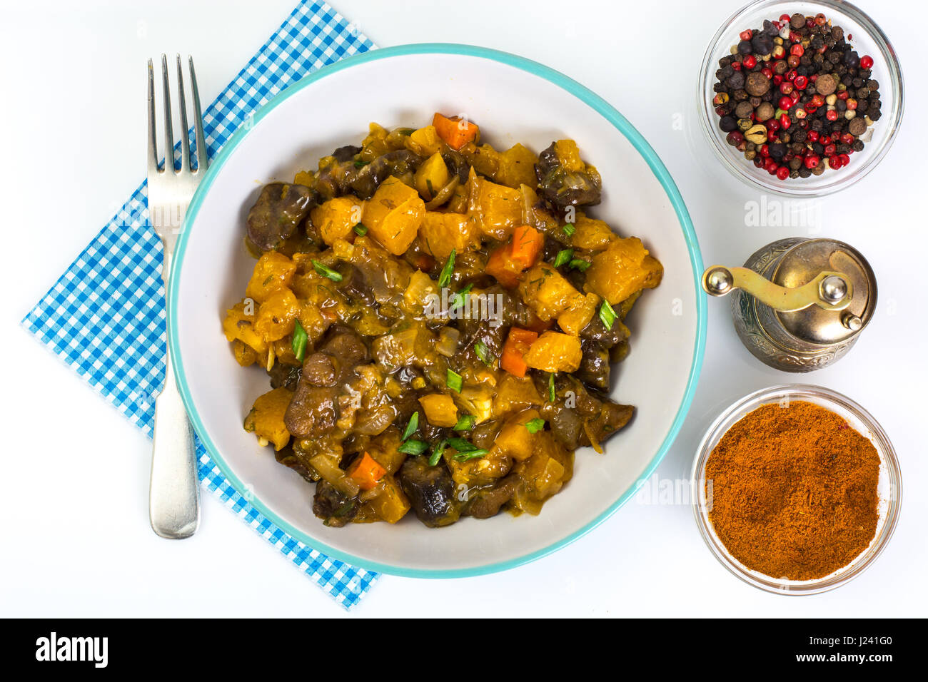 Vegetable stew in a plate on white background. Studio Photo Stock Photo ...