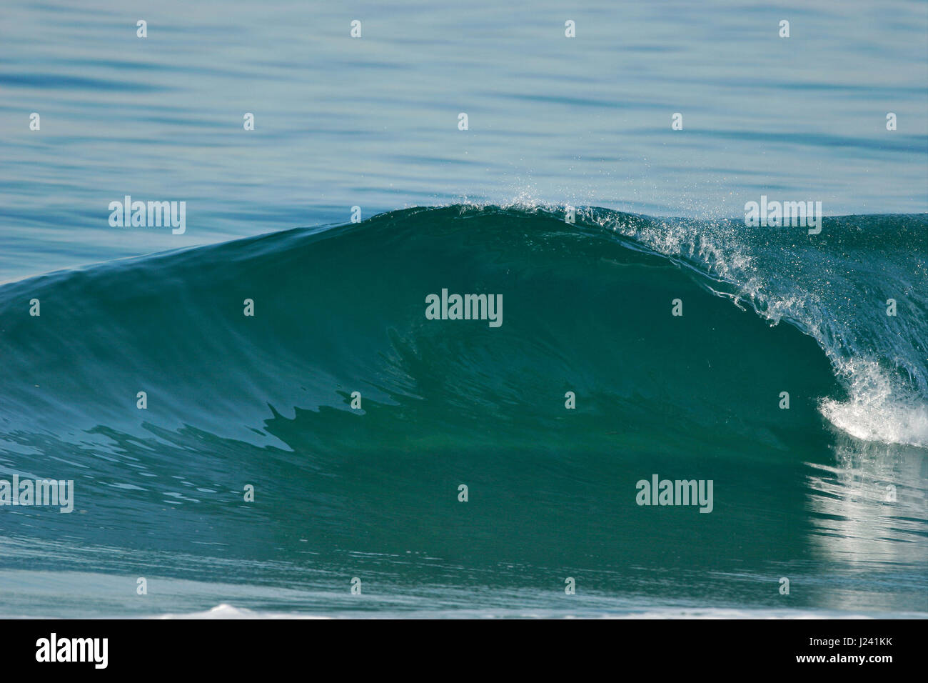 A beautiful blue ocean wave Stock Photo - Alamy