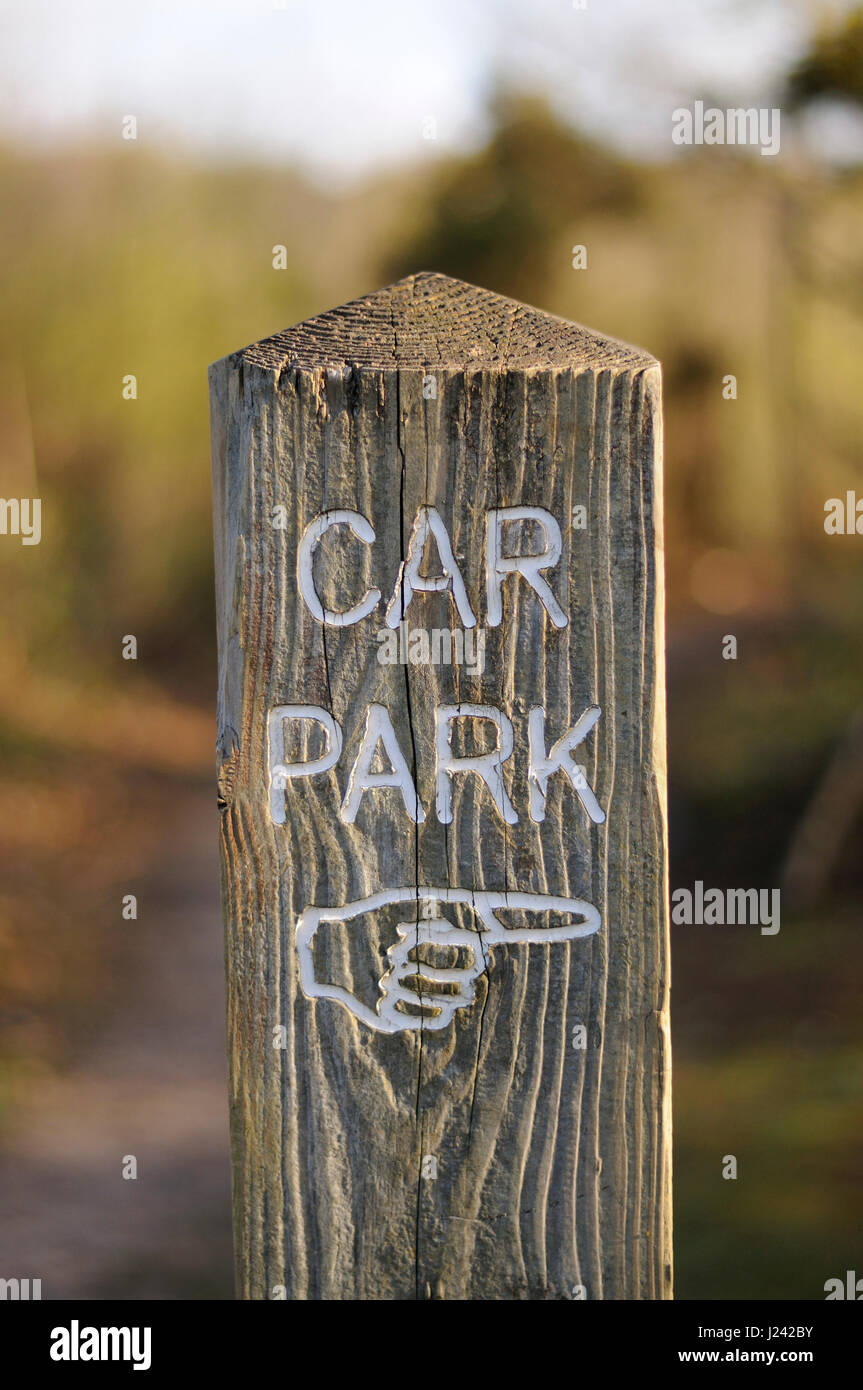 Wooden car park Directional Sign Stock Photo - Alamy