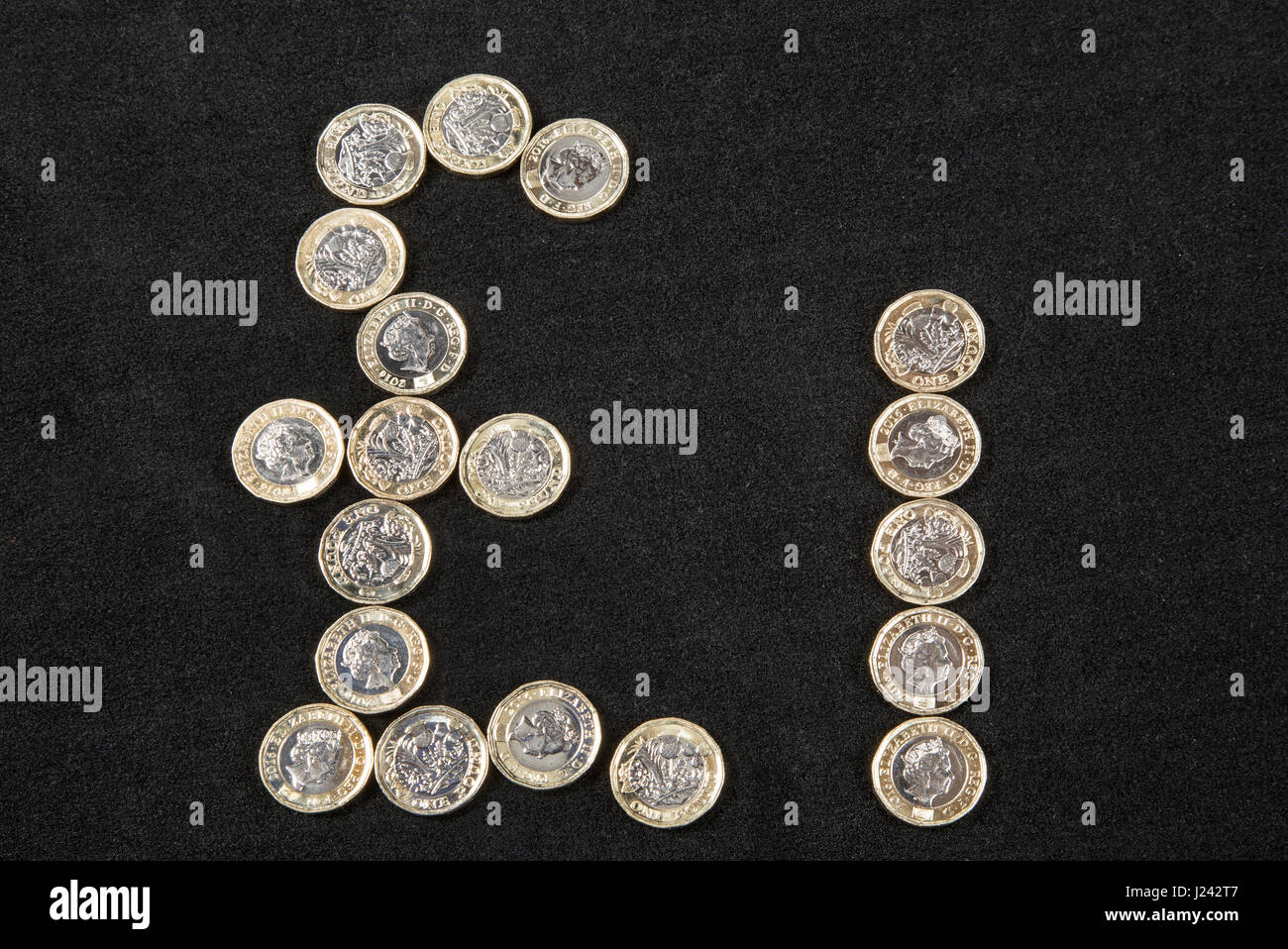 New Pound Coins laid out in the shape similar to a pound sign Stock ...