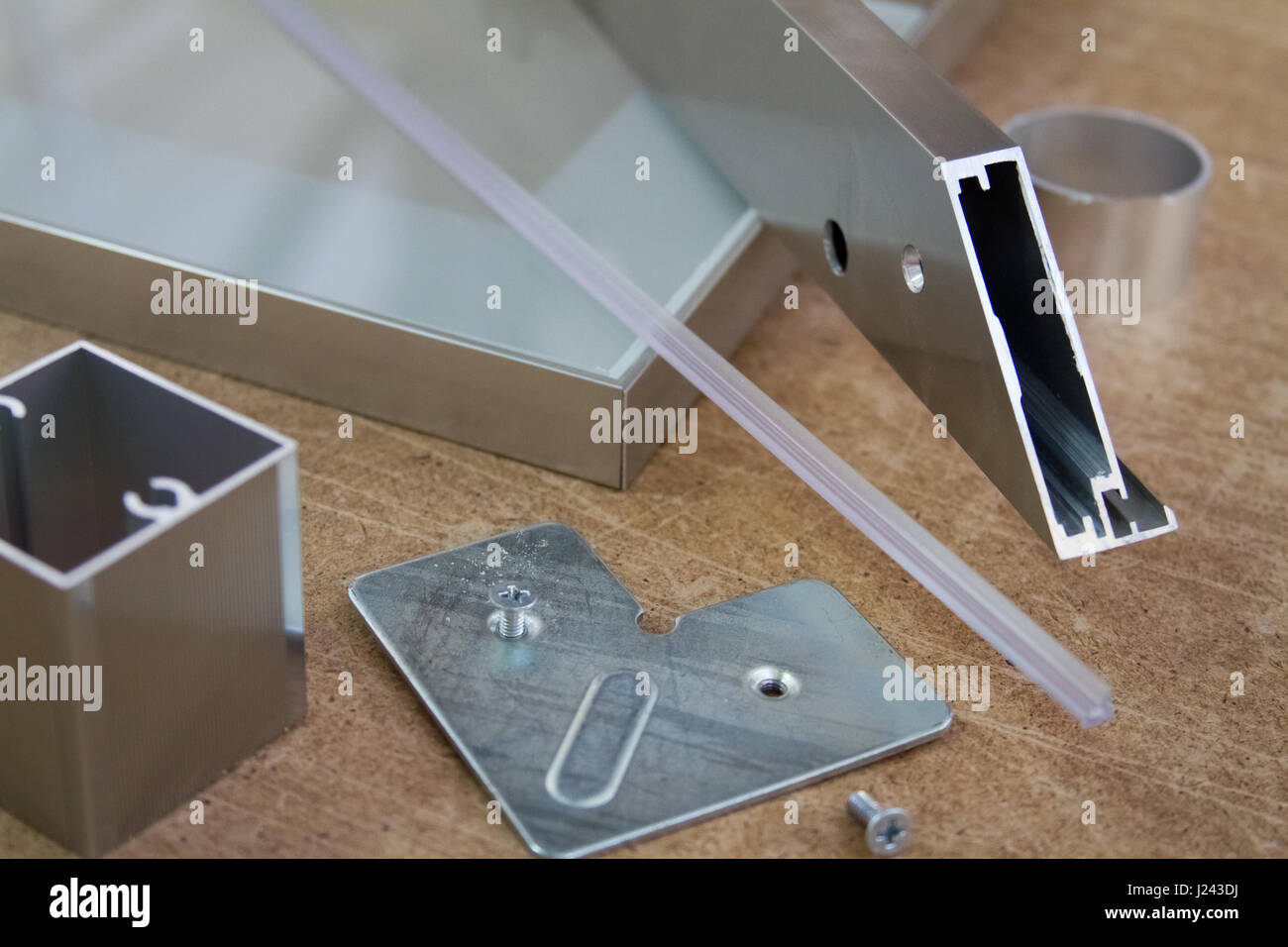 Bent metal profile channel. Furniture fittings Stock Photo - Alamy