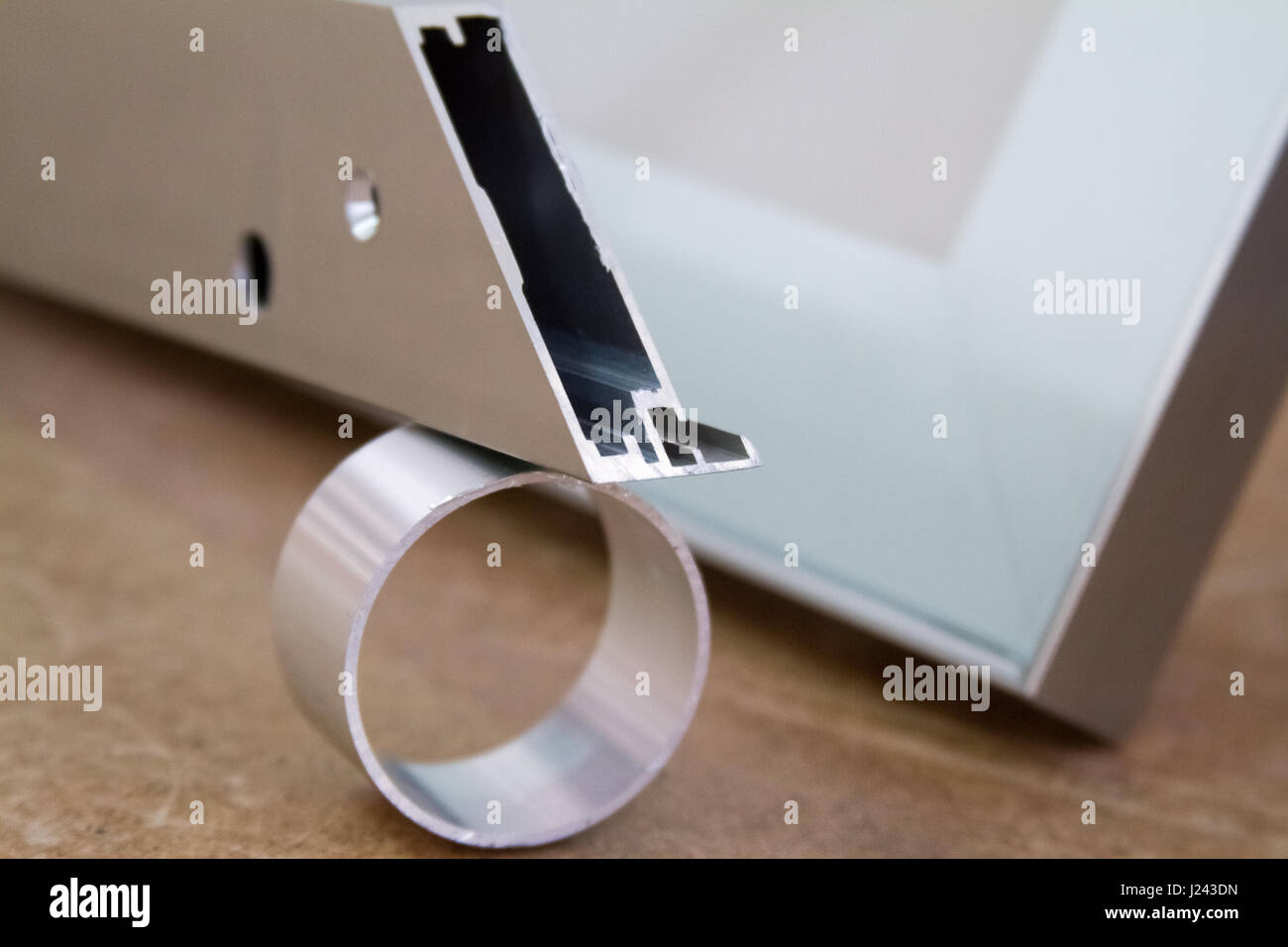 Bent metal profile channel. Furniture fittings Stock Photo - Alamy