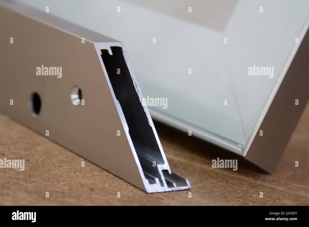 Bent metal profile channel. Furniture fittings Stock Photo - Alamy