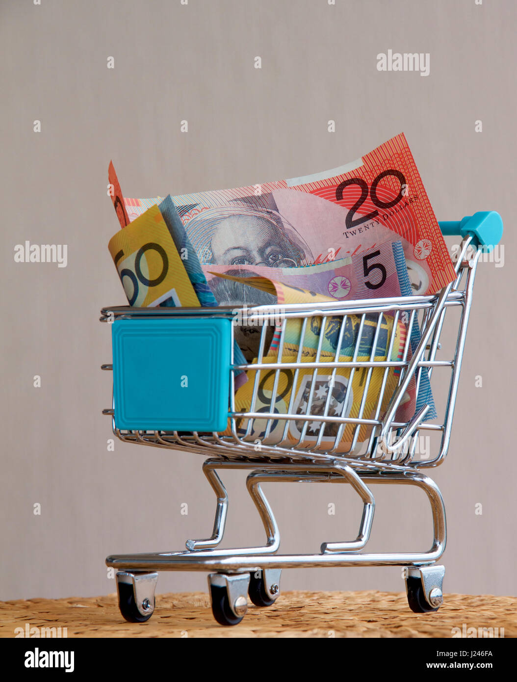 A trolley full of Australian money Stock Photo - Alamy
