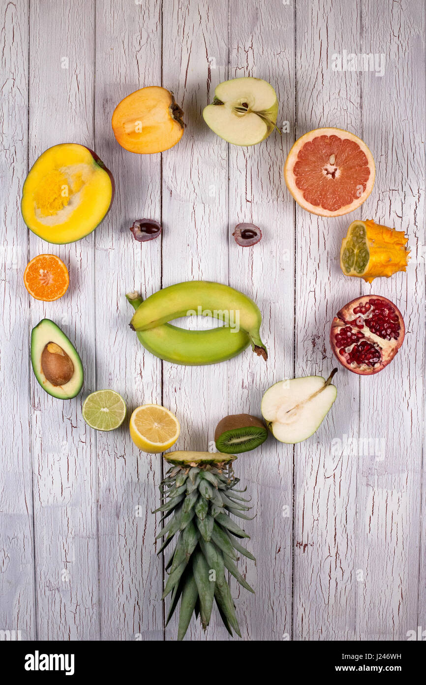 Fruit circle. Shape of a face. Ripe fresh tropical fruits Stock Photo ...