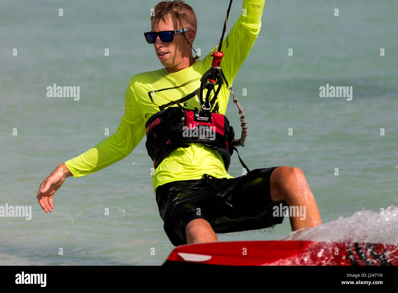 A young man parasailing at Hadicurari Beach, Aruba Stock Photo - Alamy