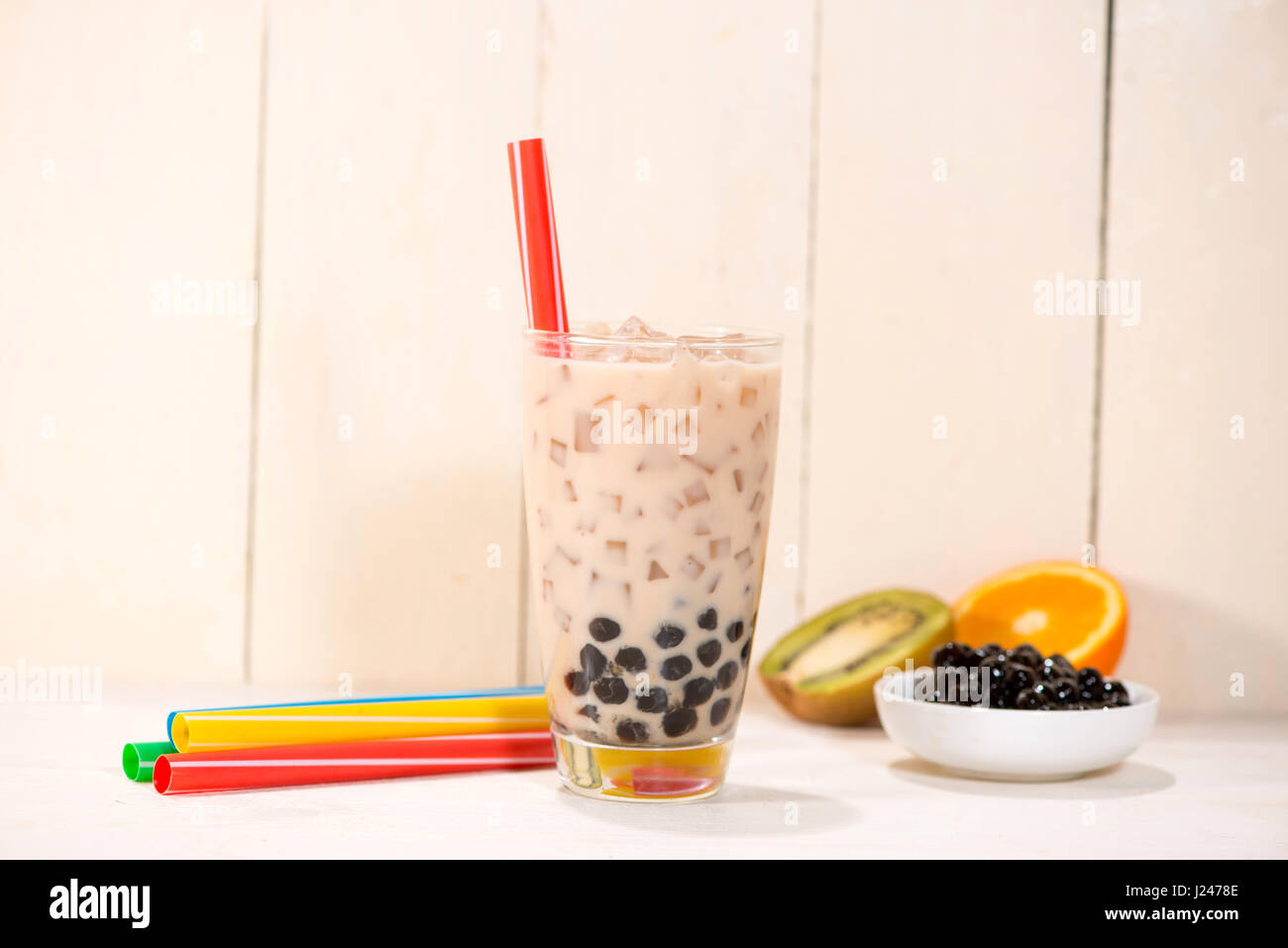 Boba / Bubble tea. Homemade Milk Tea with Pearls on wooden table Stock ...