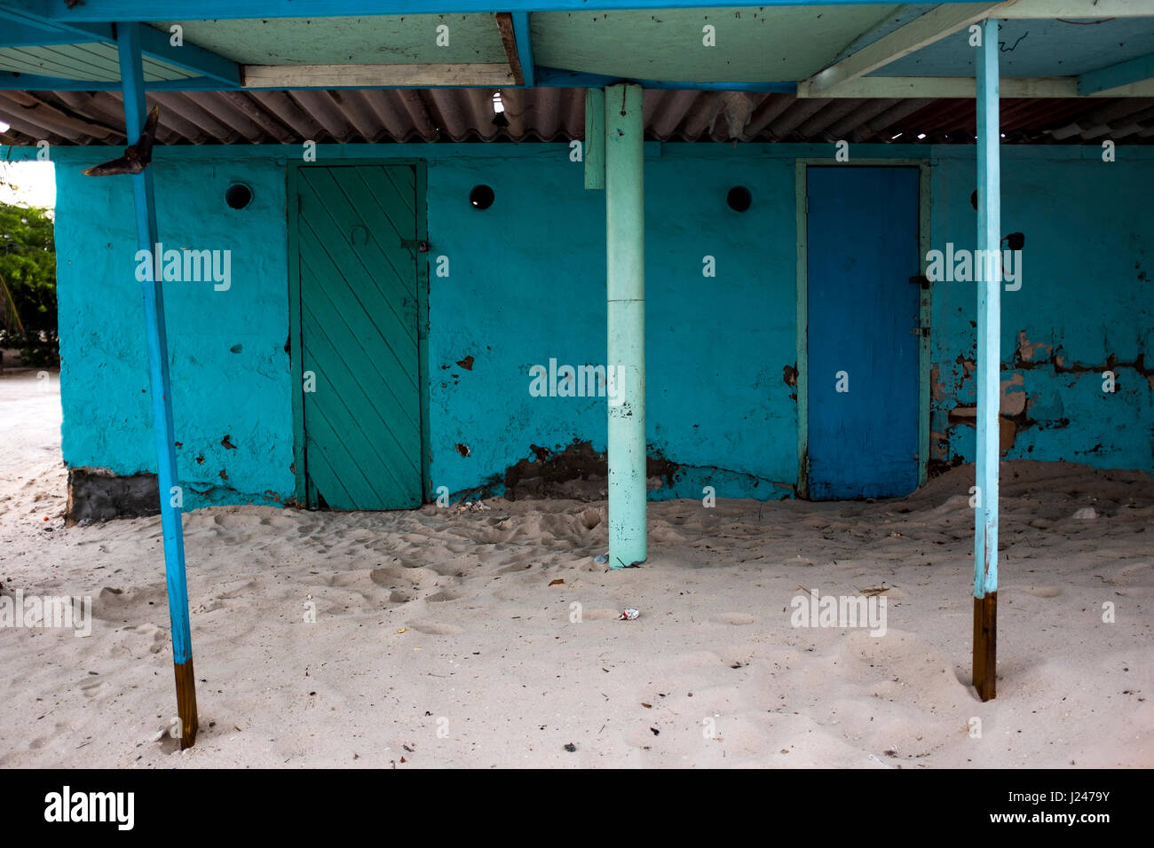 Colourful fishermans' huts, now used as beach cabanas, on Hadicurari ...