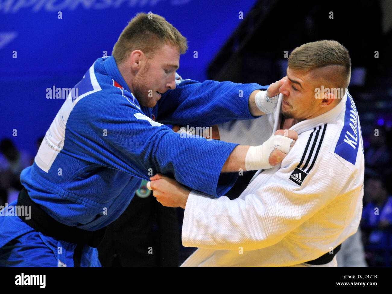 Axel Clerget of France (left) and Czech judoka David Klammert in action ...