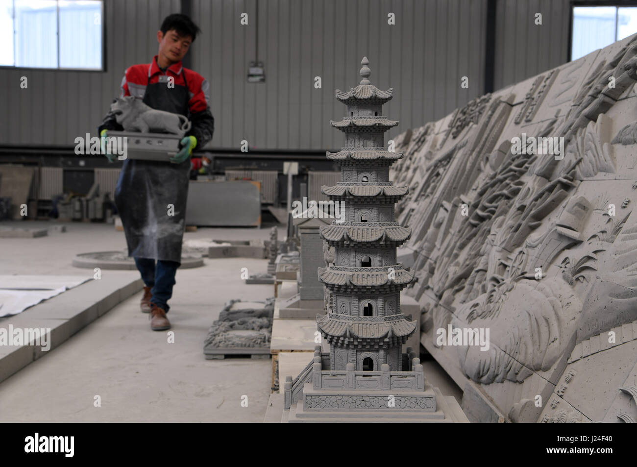 Linxia, China's Gansu Province. 23rd Apr, 2017. A brick carving artist ...