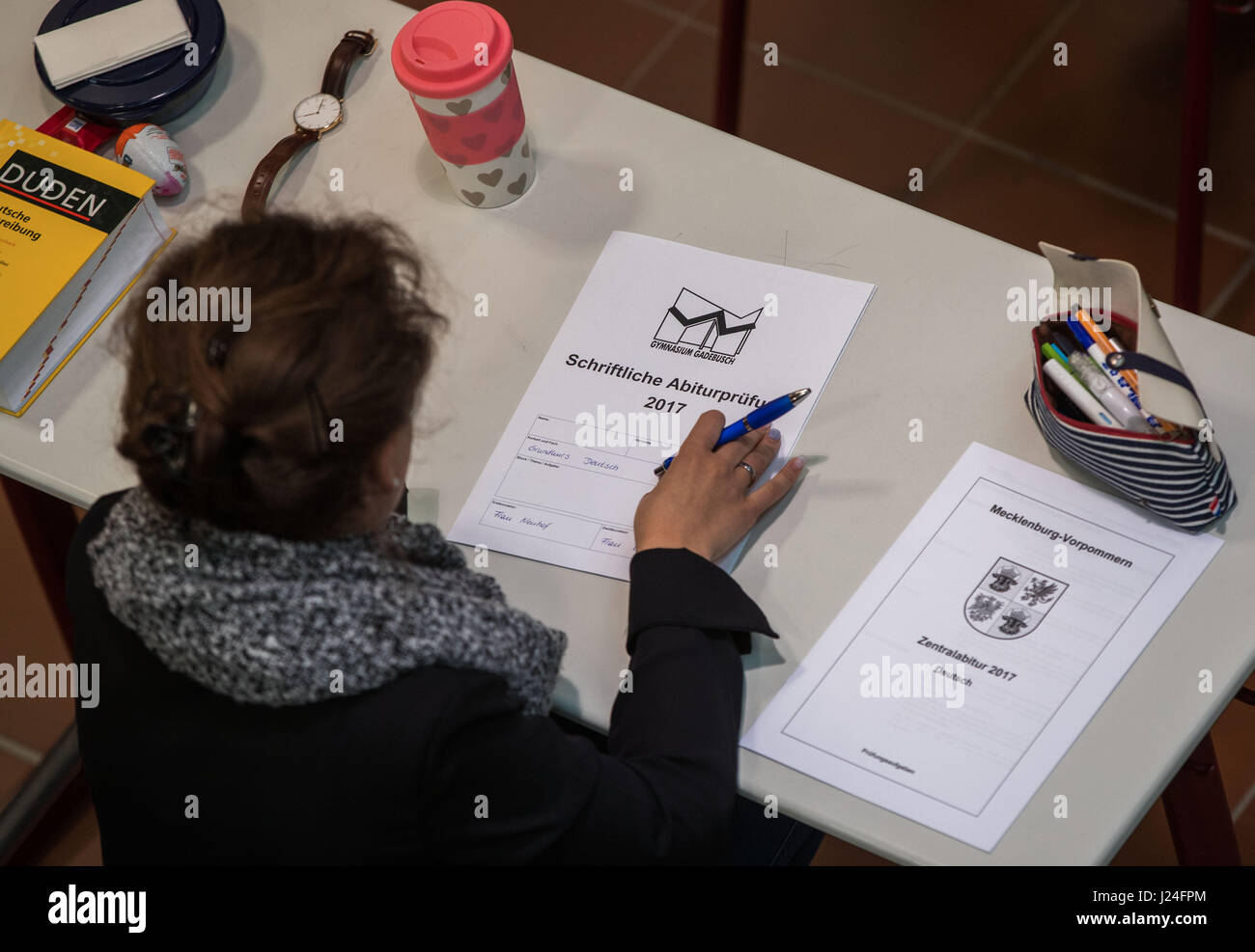 Students of the 12th grade participate in the written 'Abitur' exam ...