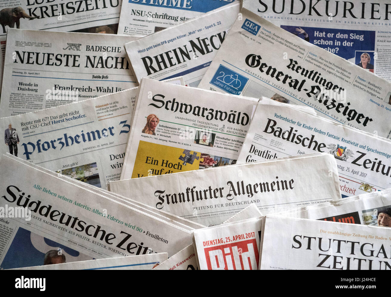 Stuttgart, Germany. 25th Apr, 2017. Different newspapers, photographed ...