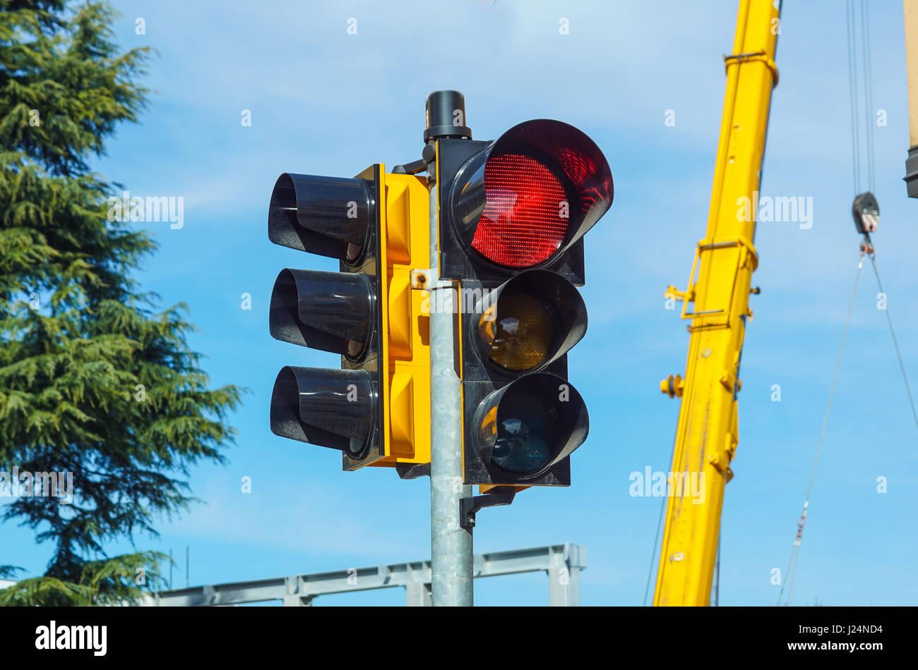 Red traffic light in the city street Stock Photo - Alamy