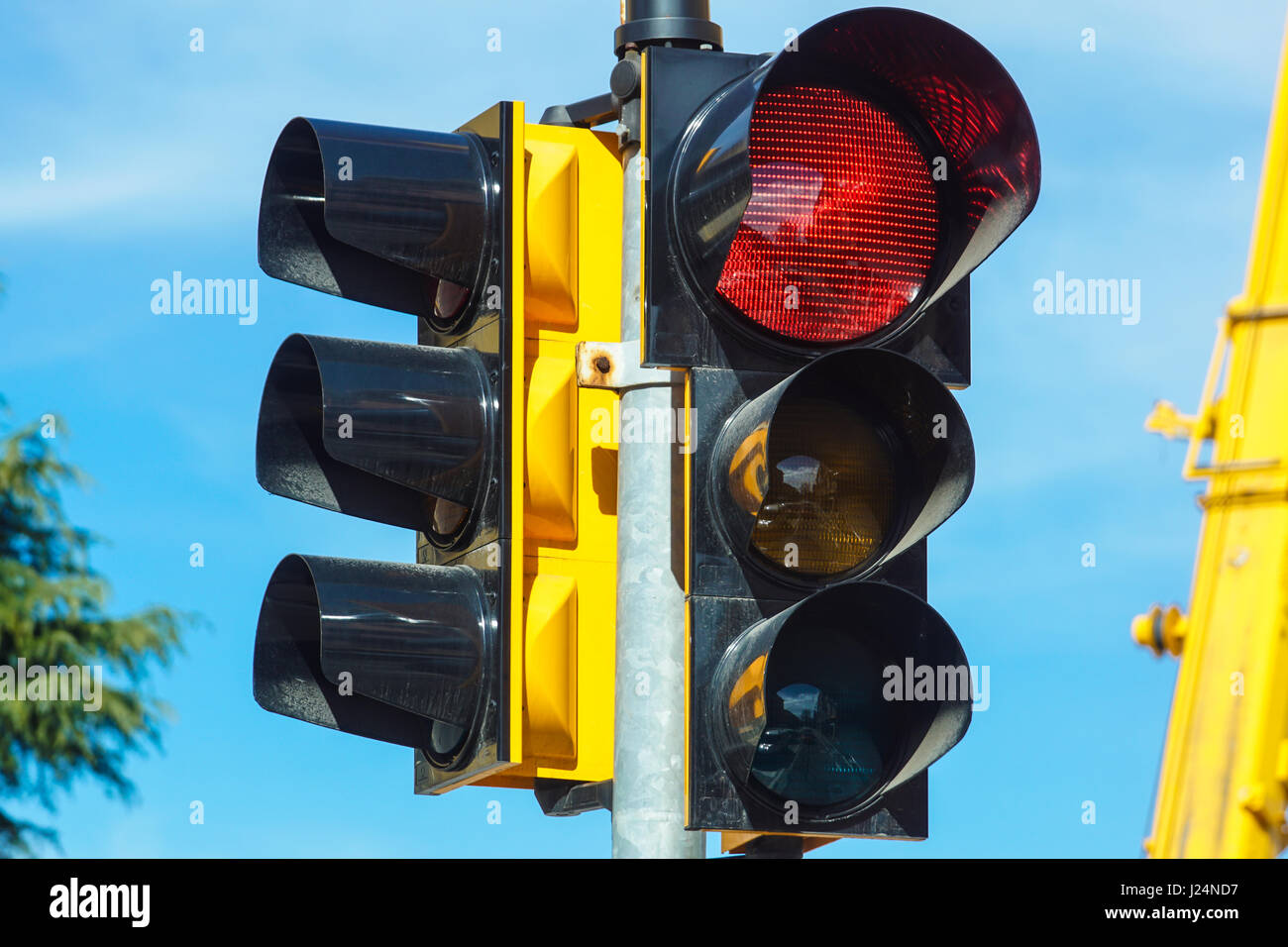 Red traffic light in the city street Stock Photo - Alamy