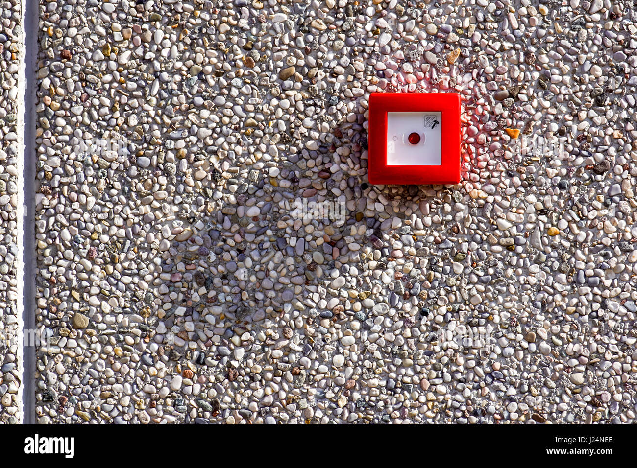 Fire alarm switch on brick wall texture background Stock Photo - Alamy