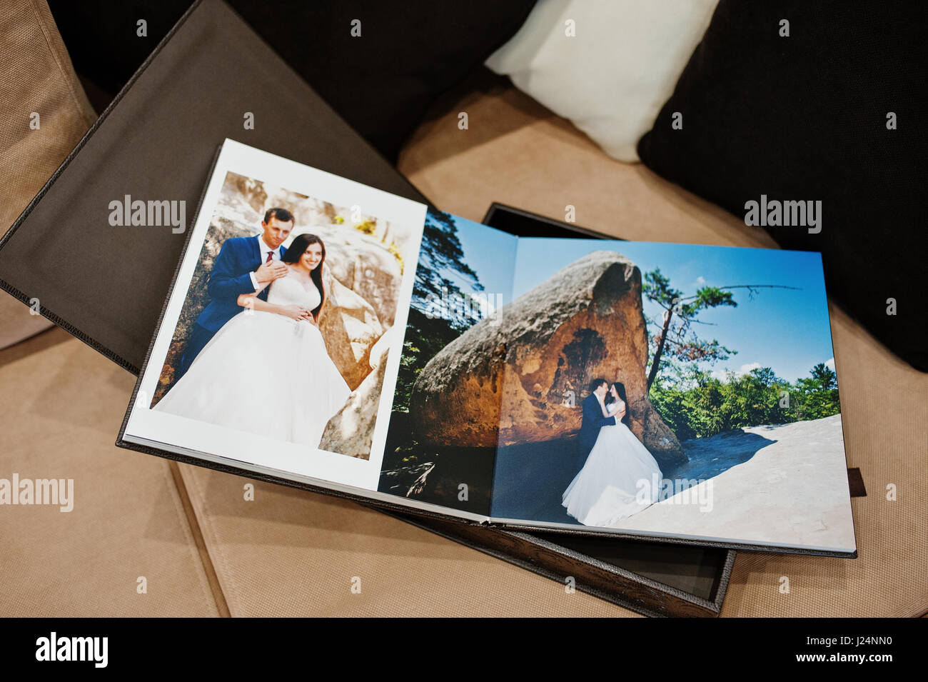 Open pages of brown luxury leather wedding book or album Stock Photo ...
