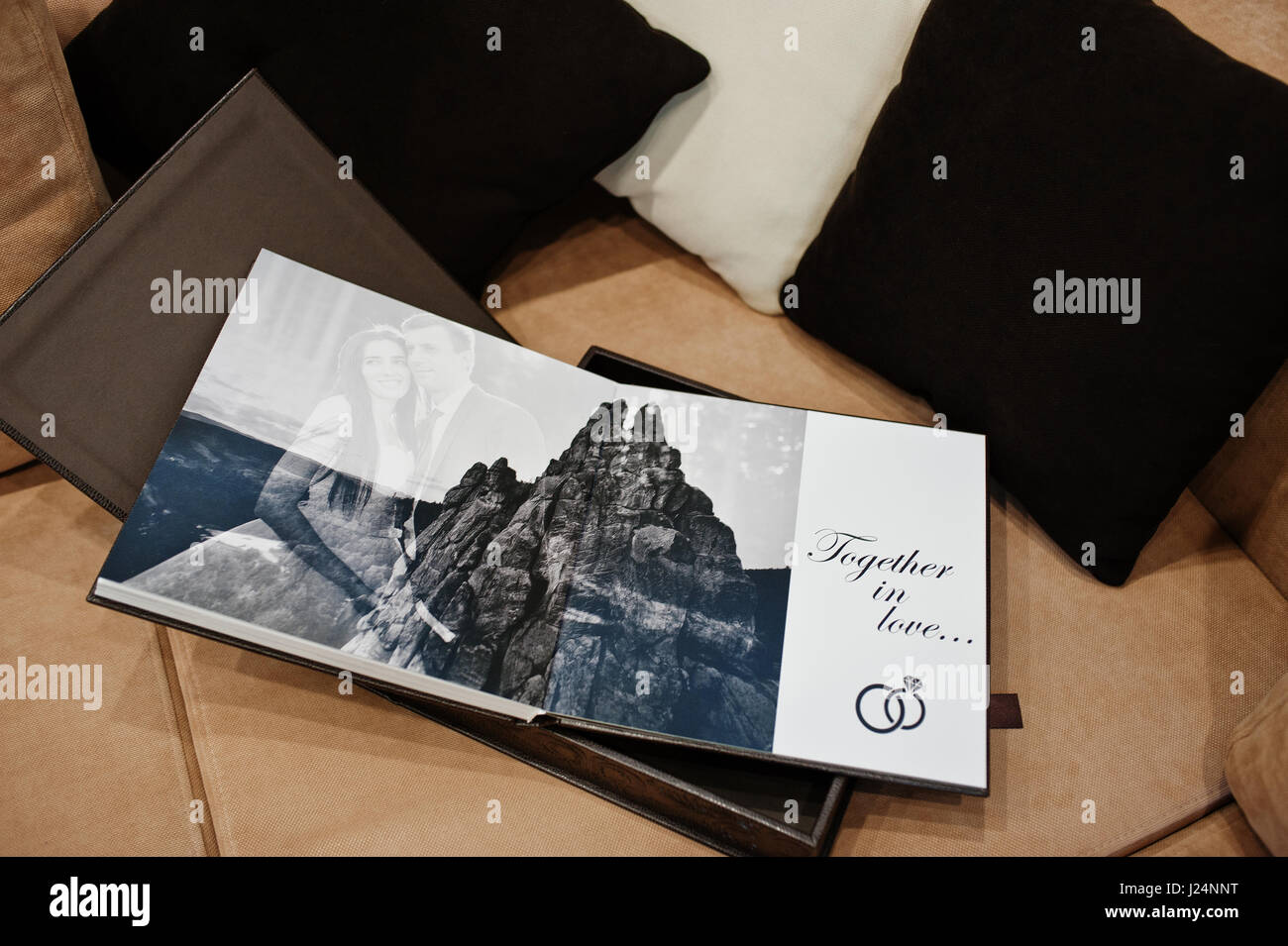 Open pages of brown luxury leather wedding book or album Stock Photo ...