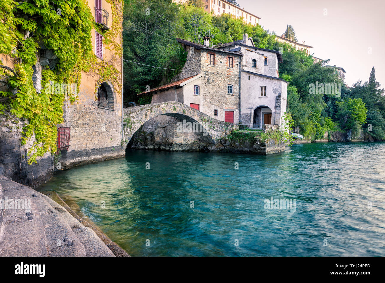 Old stone bridge at the end of Nesso's ravine (Orrido di Nesso), Como ...