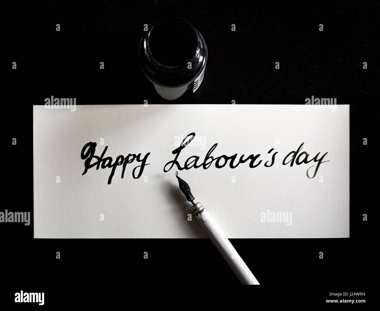Happy labour's day calligraphy and lattering post card. Top View with ...