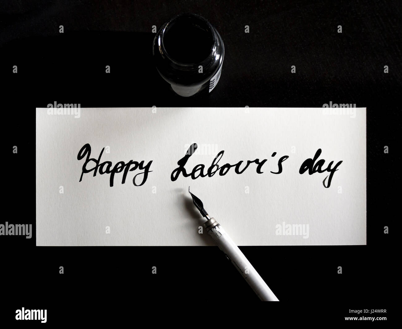 Happy labour's day calligraphy and lattering post card. Top View with ...
