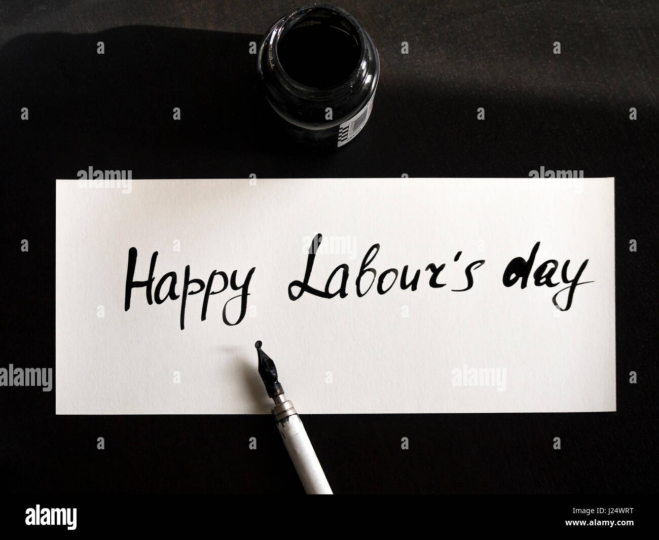 Happy labour's day calligraphy and lattering post card. Top View with ...