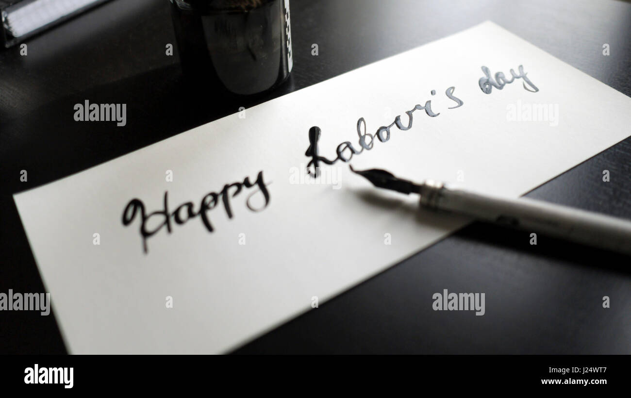 Happy labour's day calligraphy and lattering post card. Left view with ...